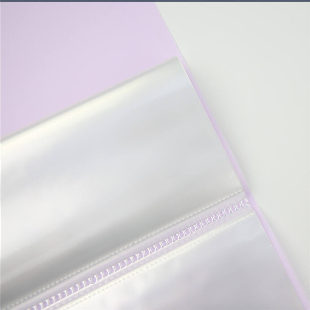 How do clear books help keep your papers organized?